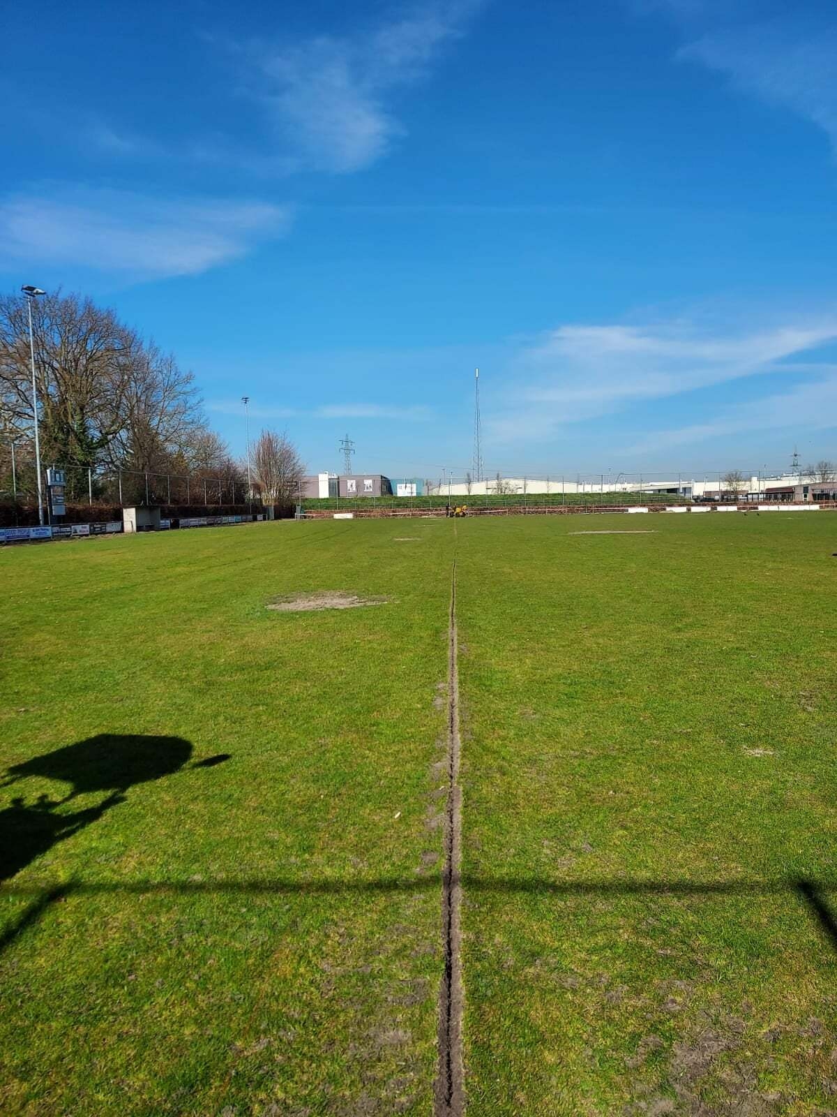 Aanleg automatisch voetbalveld beregening
